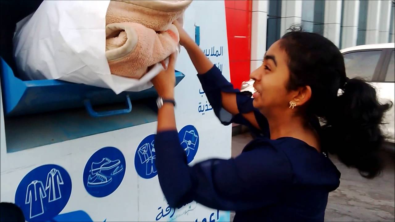 Giving clothes for donation - YouTube