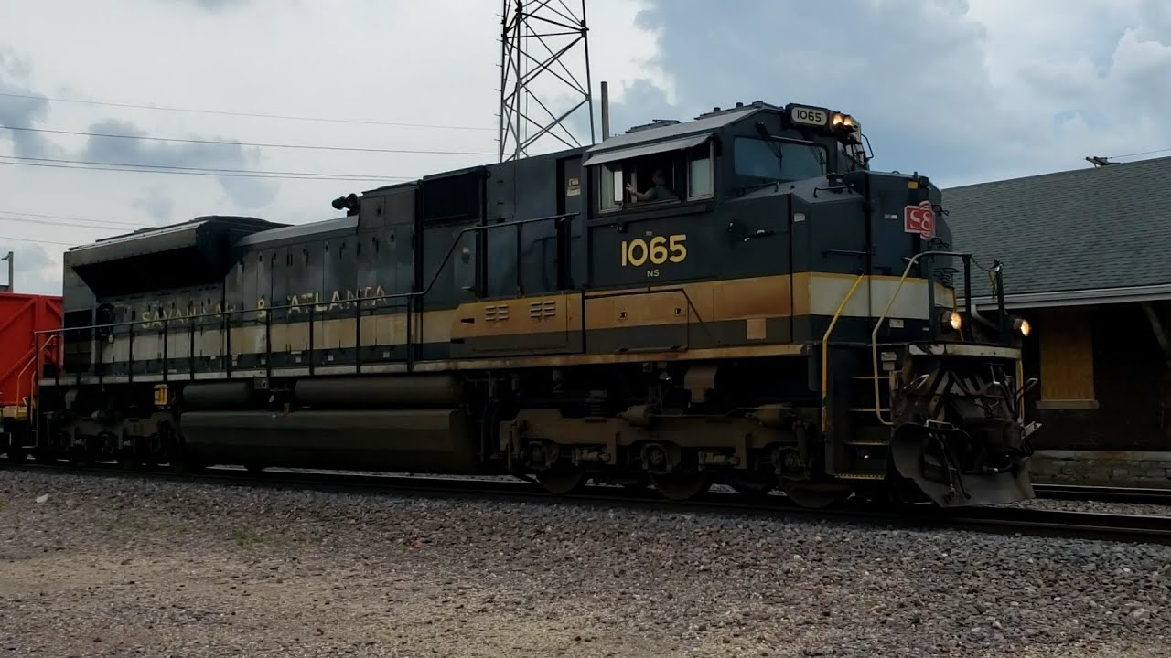NS 1065 leading a continuous welded rail train through DeKalb IL - YouTube