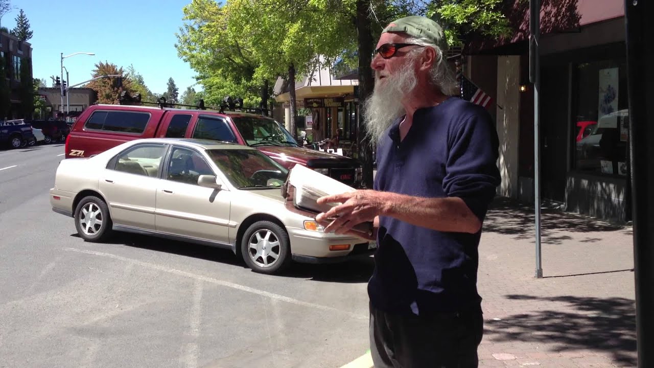 guy yelling the bible outloud on street corner - YouTube