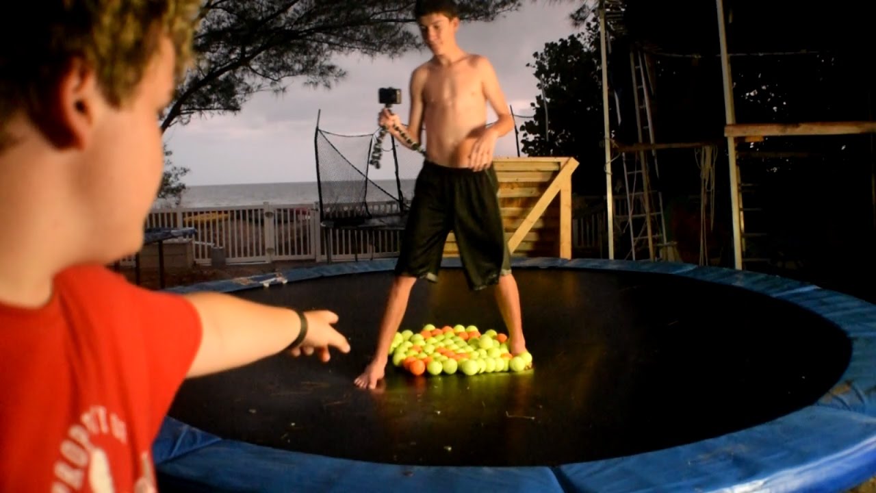 TRAMPOLINE VS TENNIS BALLS - YouTube