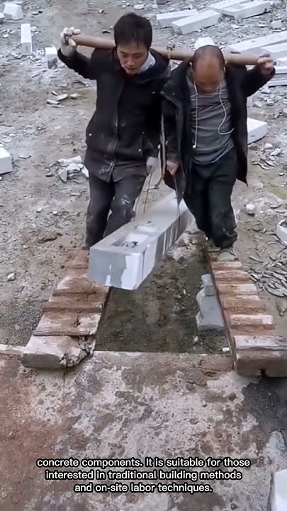 Workers Lift and Load a Concrete Prefab Piece by Hand - YouTube