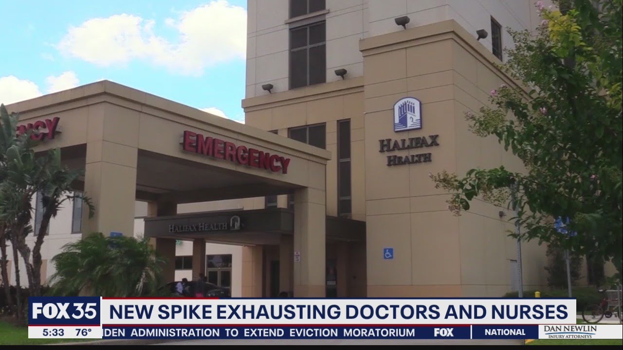 New spike in COVID cases exhausting doctors and nurses - YouTube