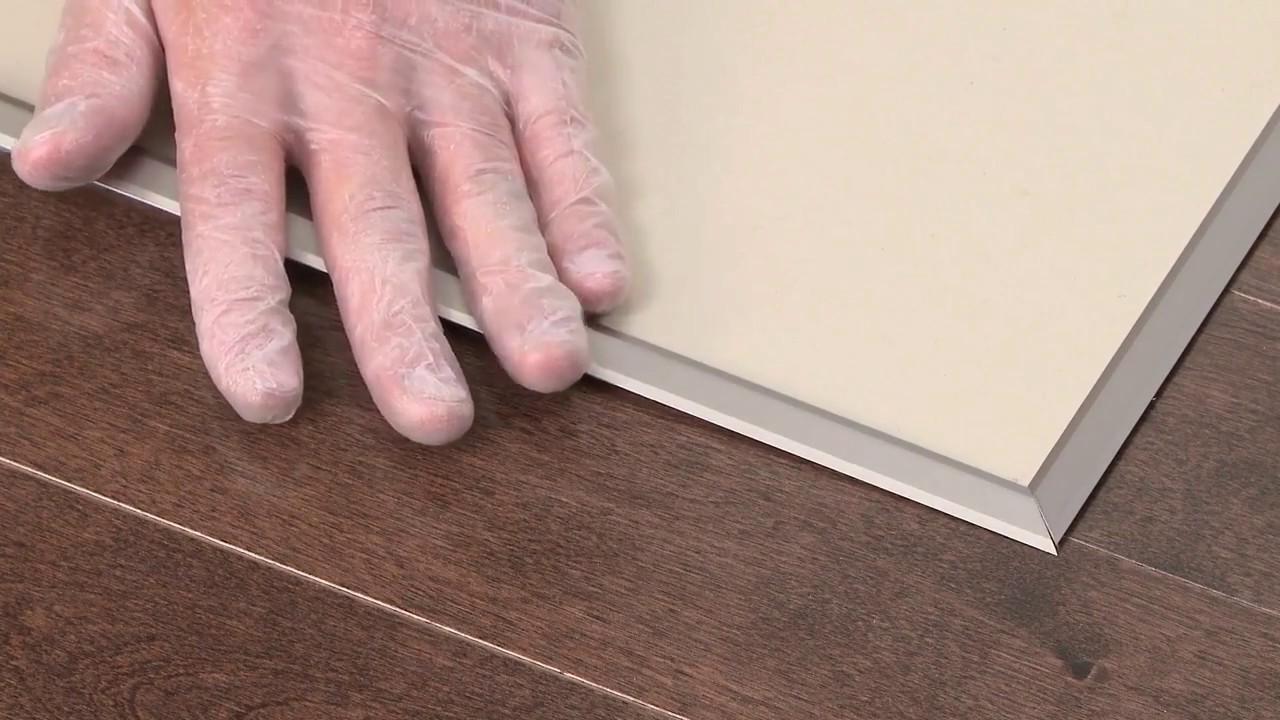 Connect Two Flooring Surfaces with Reno-T Ramp Trim - YouTube