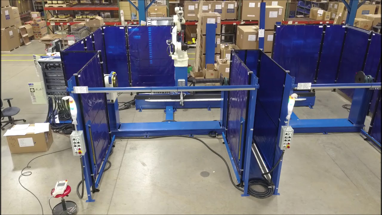 LT-ARC slider-mounted robotic welding robot cell - YouTube