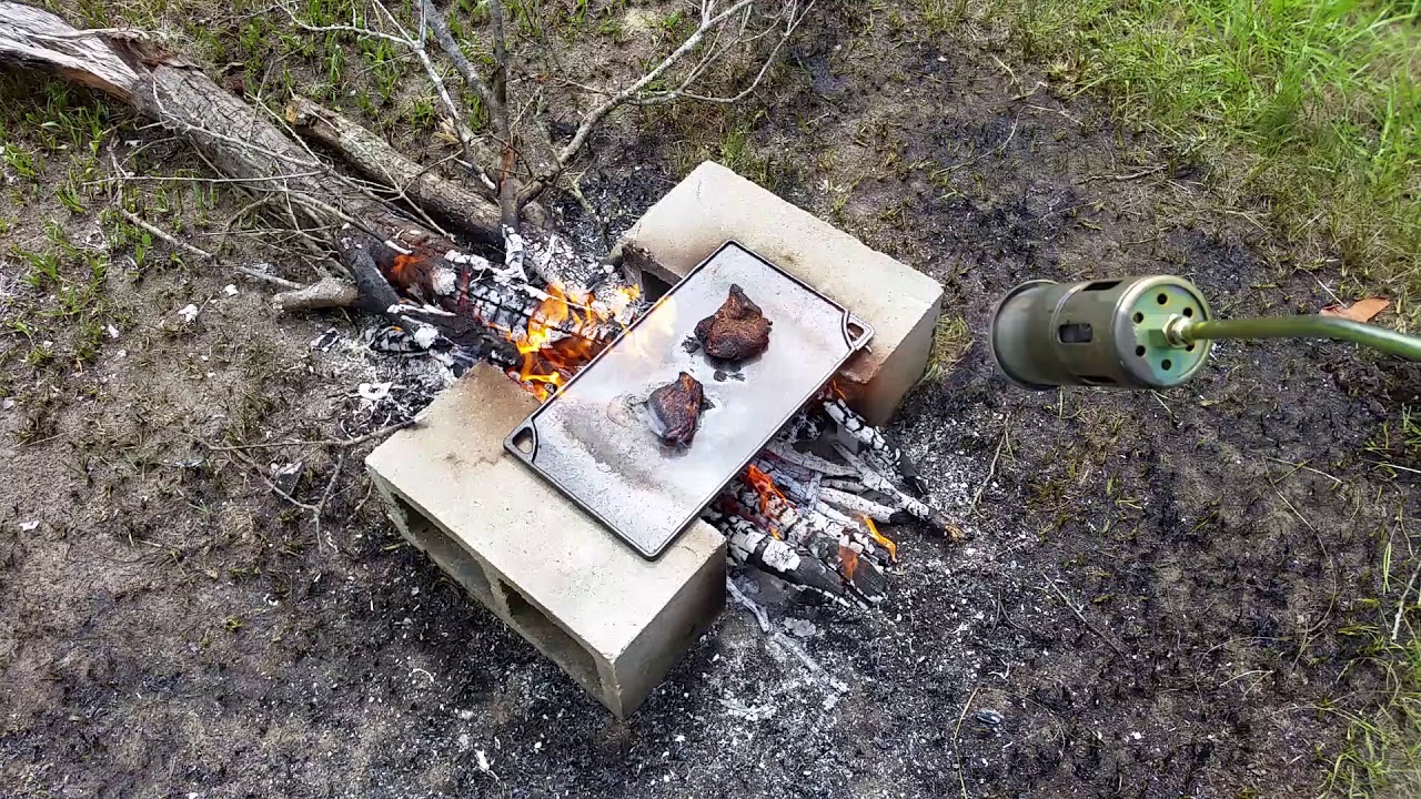 Burning steak with the harbor freight flame thrower. - YouTube