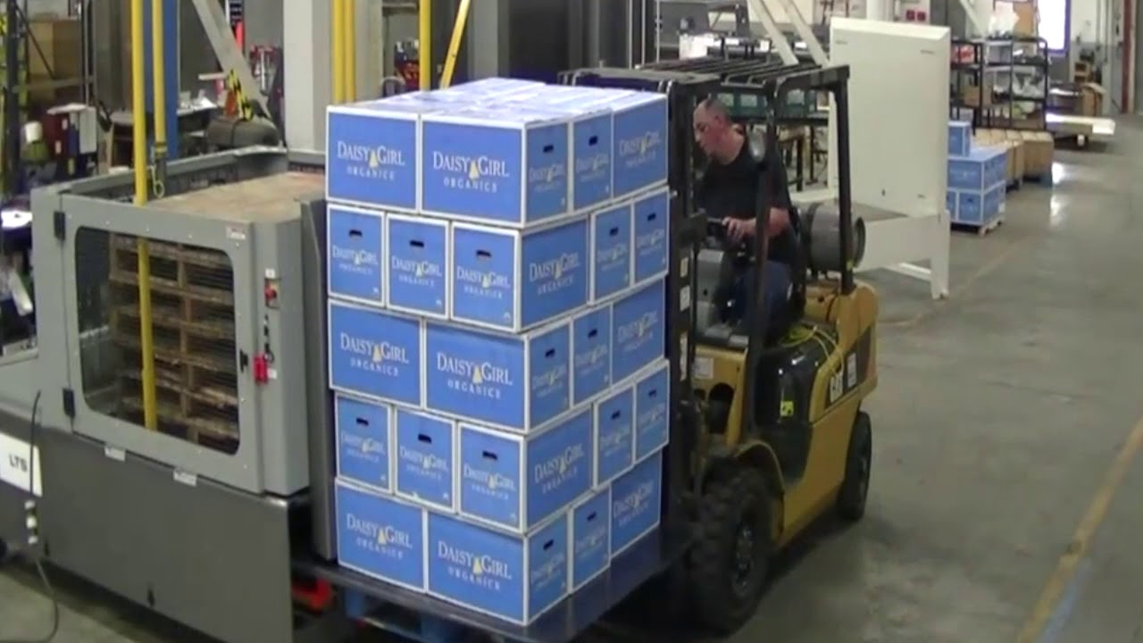 Load Transfer Station (LTS) Transferring Pallet Load from a Wood to ...