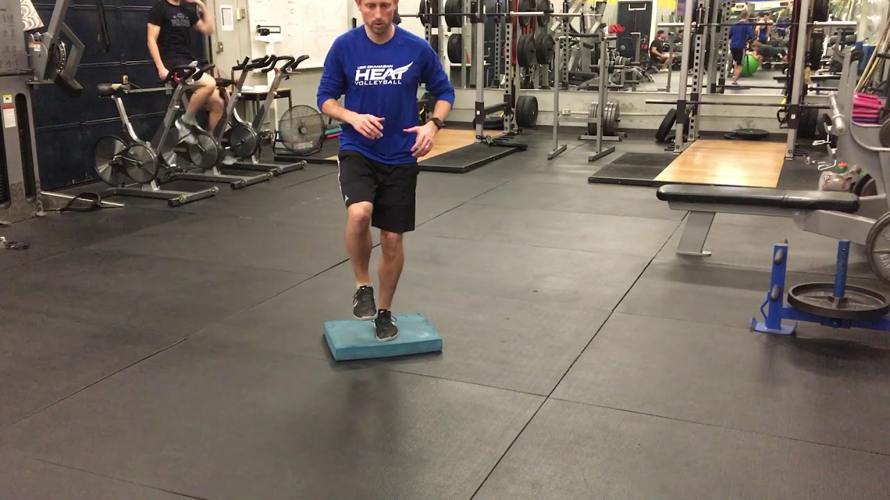 Single leg balance on AirEx pad - YouTube