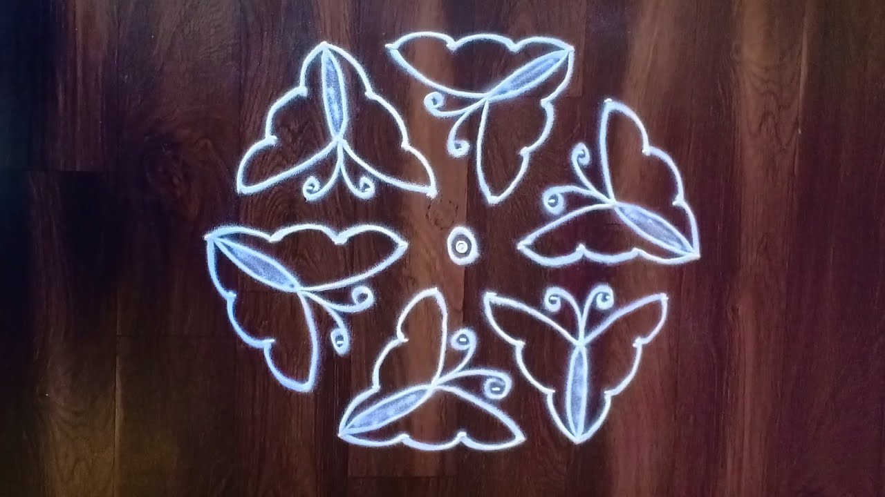 Simple Rangoli designs | butterfly design Rangoli | butterfly muggu ...
