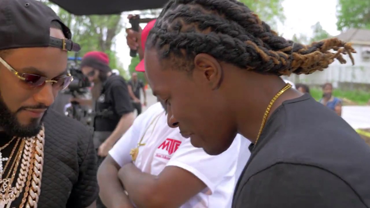 Young Lace comes back home and gives back to his community and shouts ...