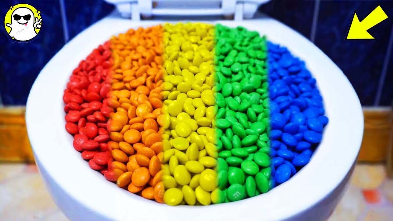 Flushing Colorful M&Ms Candy - Will it Flush? - YouTube