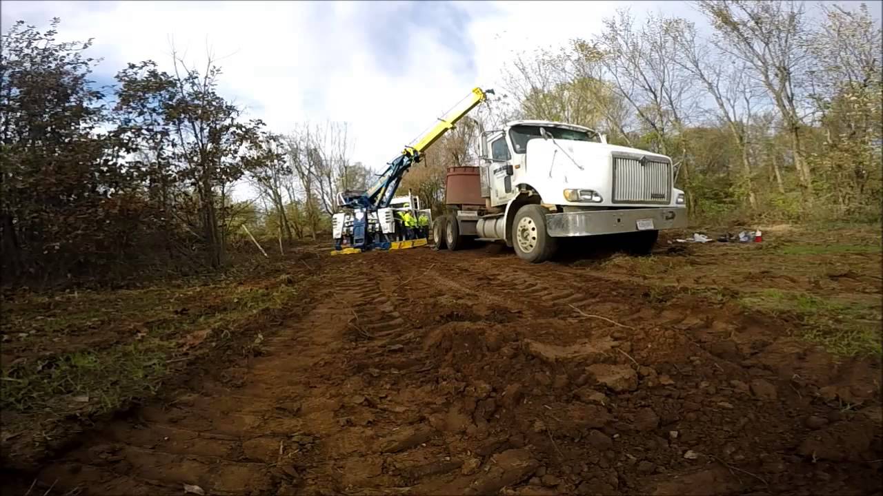 Midwest Truck Lift and Swing Around Dump Trailer after Uprighted - YouTube