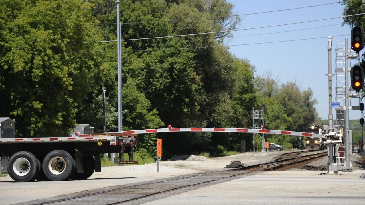 Semi Truck Hits Railroad Crossing Gate! + Crossing Malfunctions - YouTube