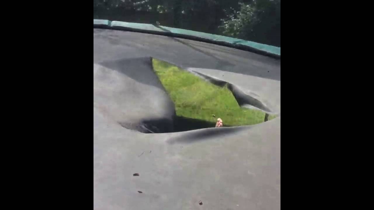 Falling through a trampoline - YouTube