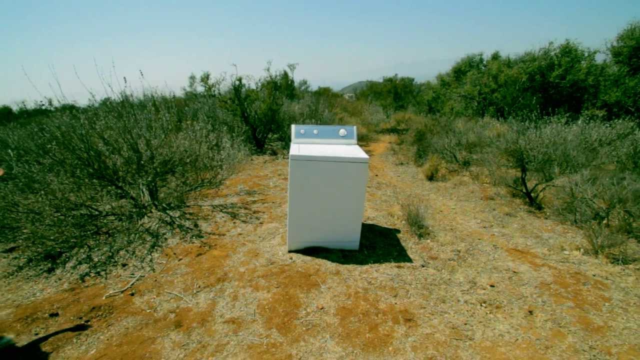 The right way to carry a washing machine up a mountain - YouTube