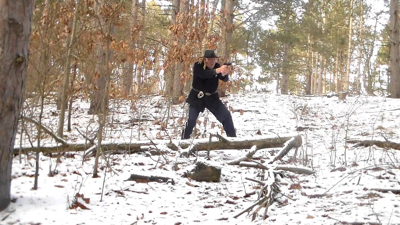 Arnold Mackey firing a 45 Auto - YouTube