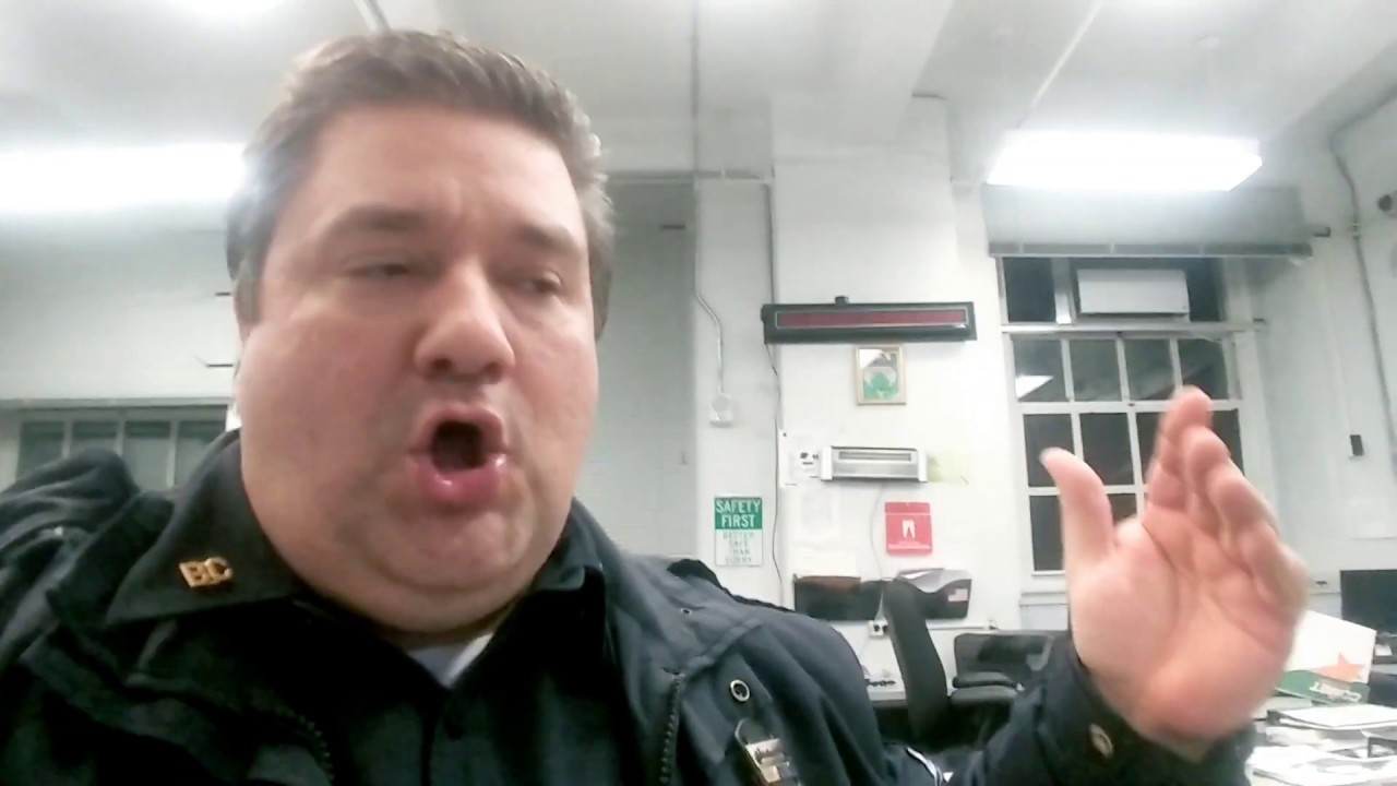 The Singing Cop Singing Auld Lang Syne - YouTube