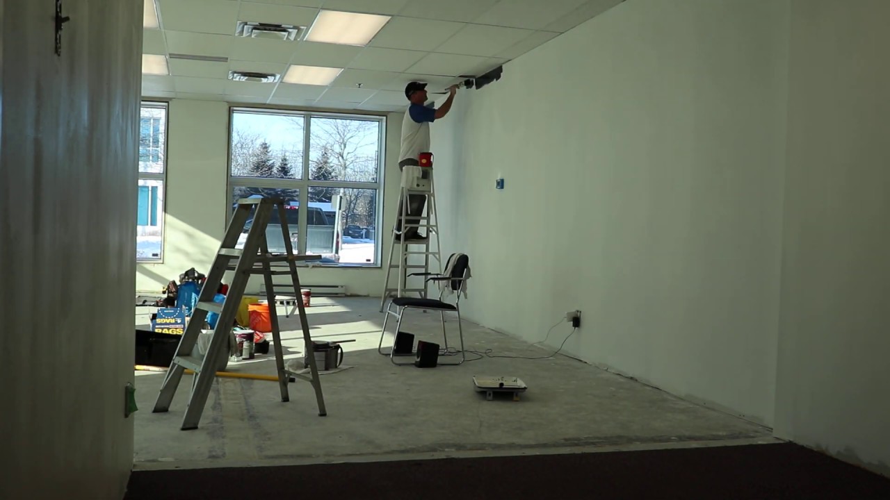 Painting our feature wall at Pivot + Edge - YouTube