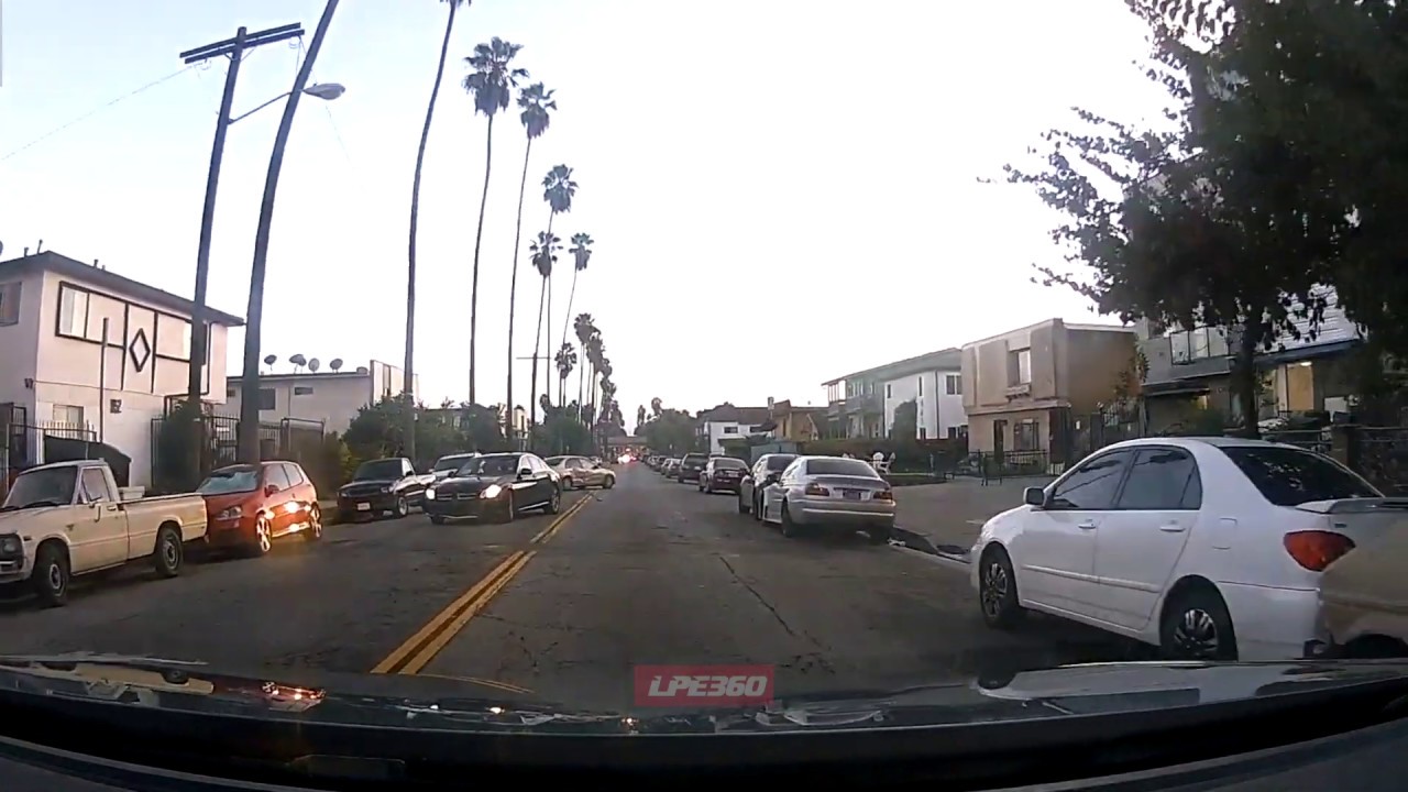 Car pulls out of driveway and hits car - YouTube