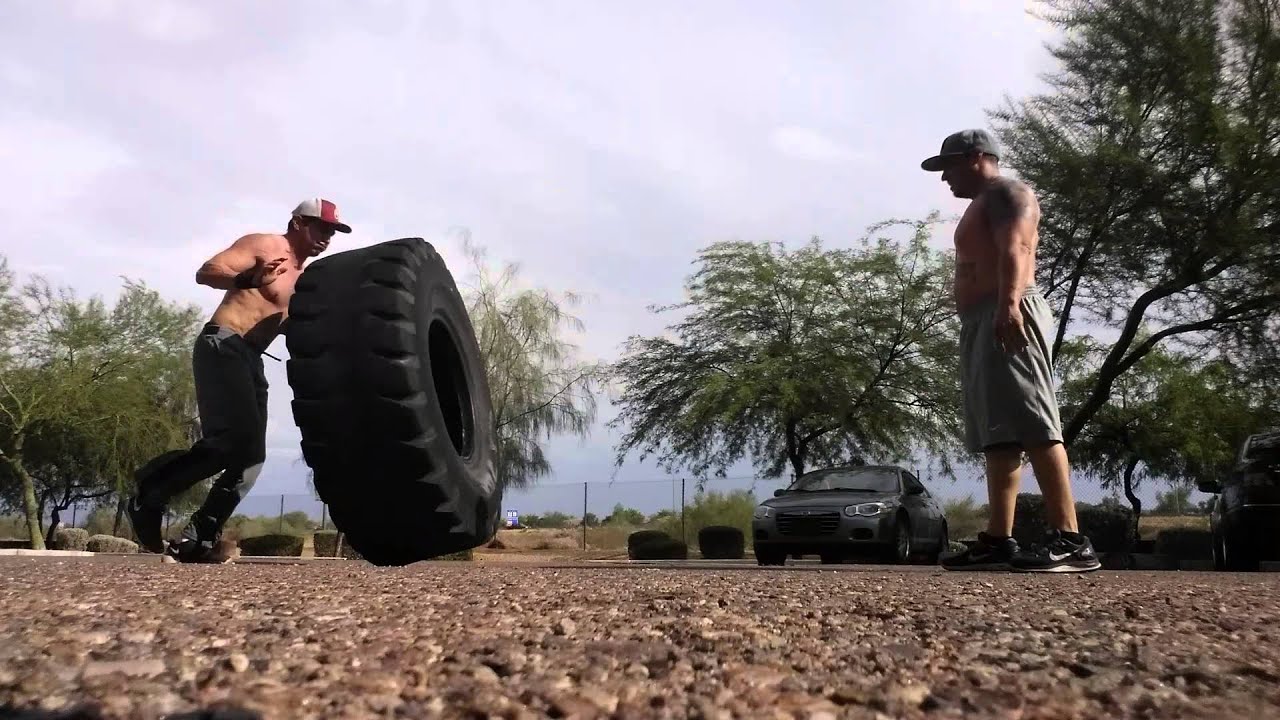 400 lb Tractor tire flips - YouTube