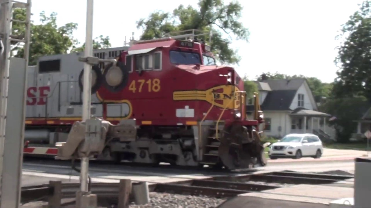 BNSF #4718 (BNSF Warbonnet) leads EB Cargill Feed Train. Olathe, KS 7/4 ...