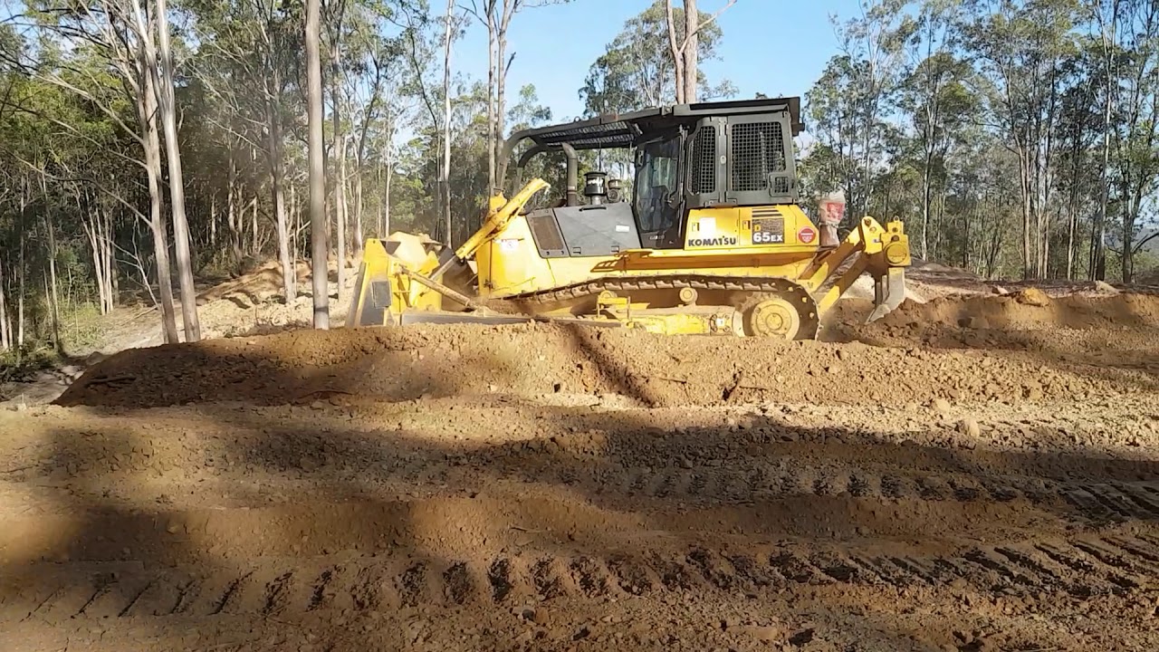 Dozer pushing dirt - YouTube