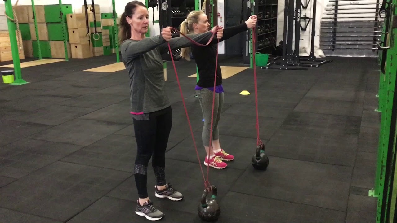 Banded core front raise - YouTube