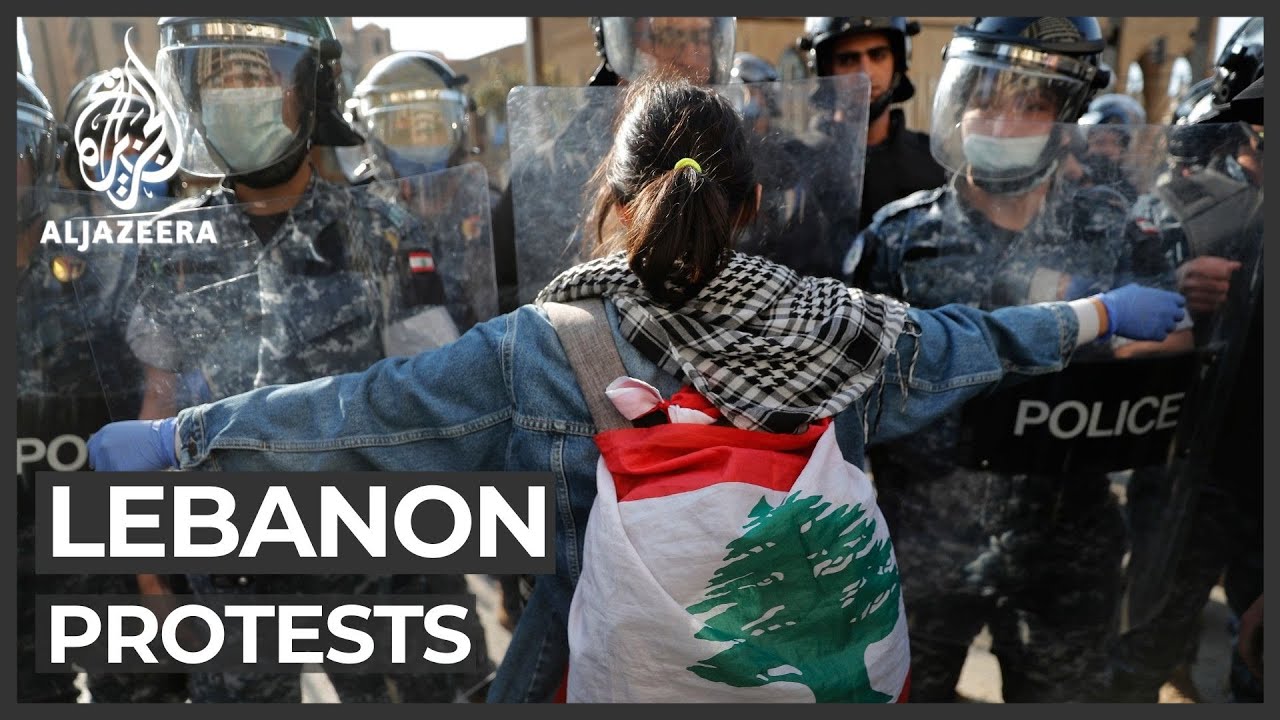 One dead, dozens injured in Lebanon riots with banks smashed - YouTube