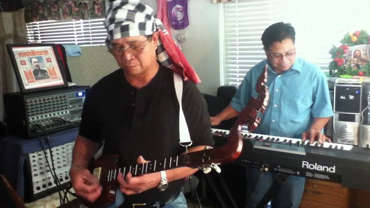 Lao Pin Guitar Player - YouTube