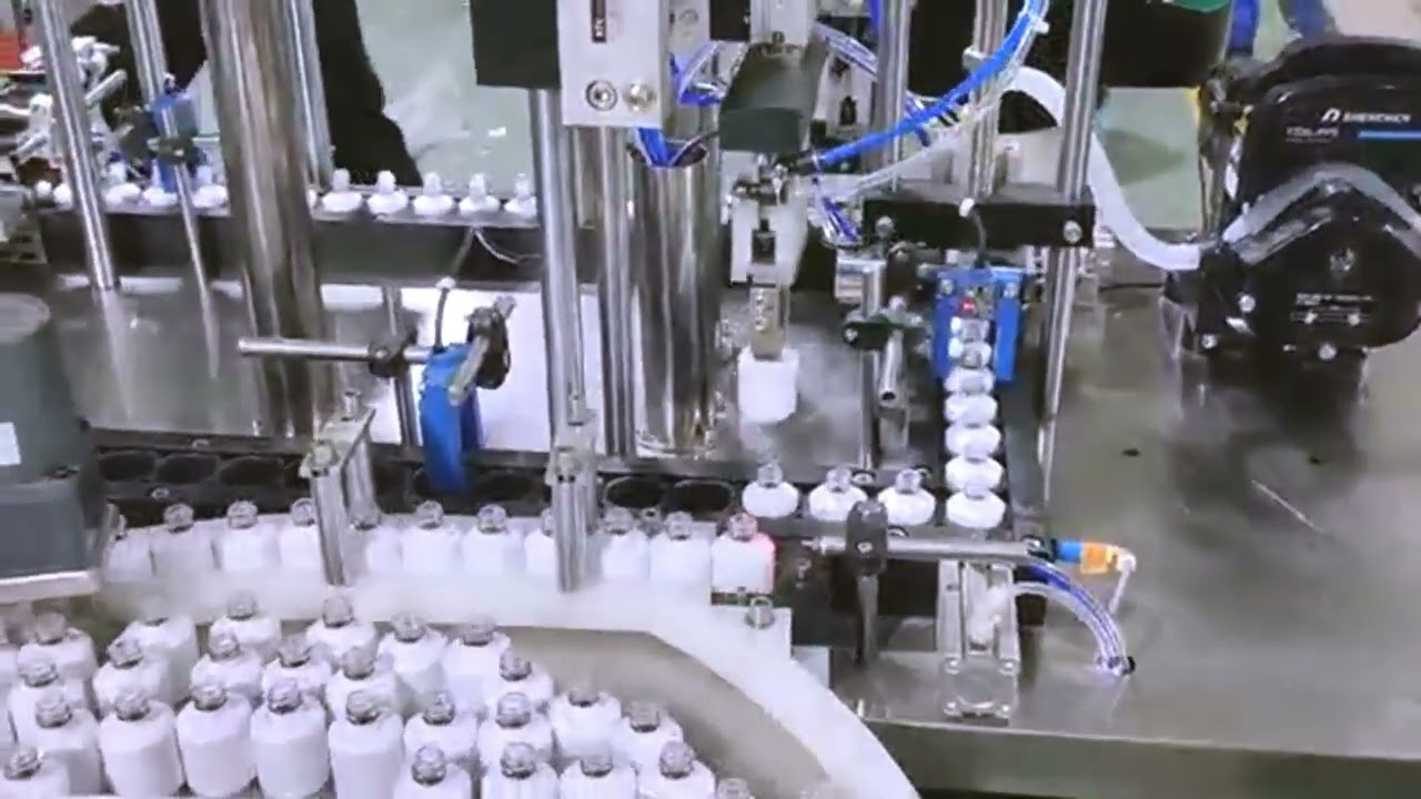 Multifunction nail polish bottles filling capping machine automatic rotary filler capper - YouTube