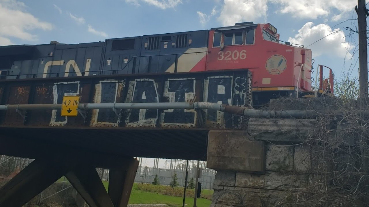 TRAINS CN Mixed Freight With Transformer Loads at St Patrick Street ...