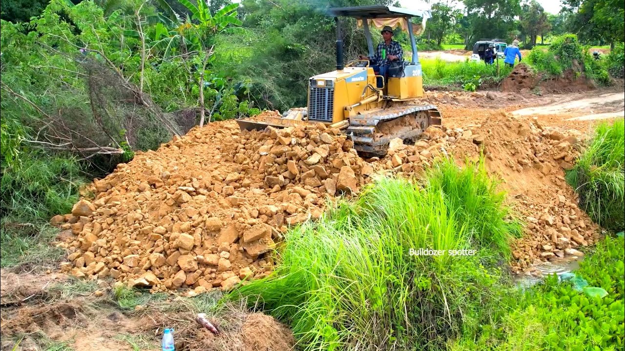 Full video dump truck unloading Stone Landfill building new road and ...