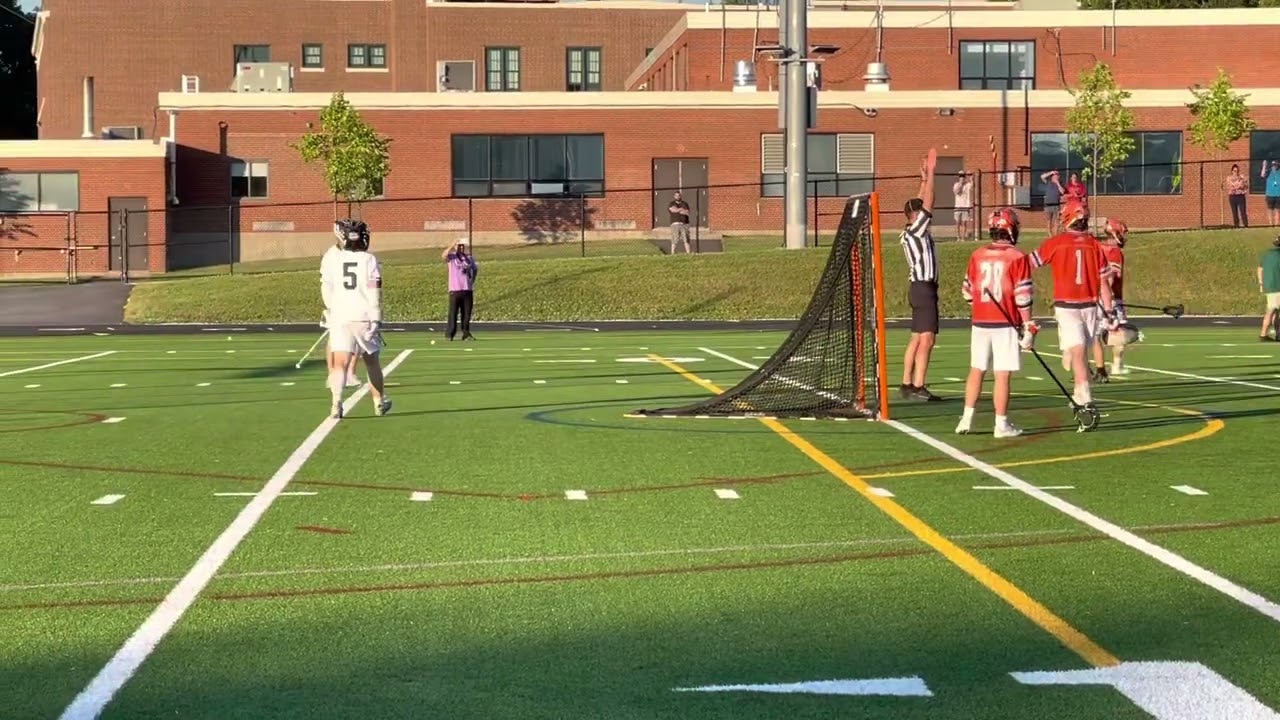 Billerica’s Conor Doherty slides in his third goal of the first quarter ...