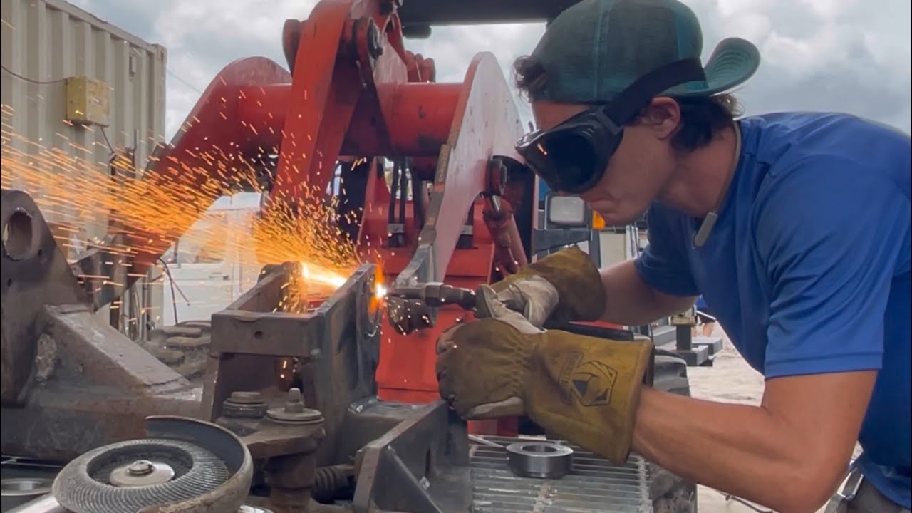 Welding on a Kubota Loader (Pins and Bushing repair) - YouTube