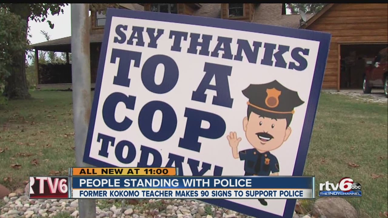 Man shows support for police with yard signs - YouTube