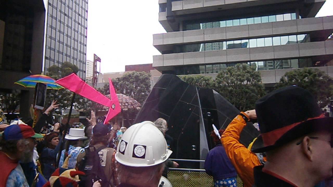 THROWING PENNIES AT THE BANKER'S HEART on ST STUPID'S DAY - YouTube