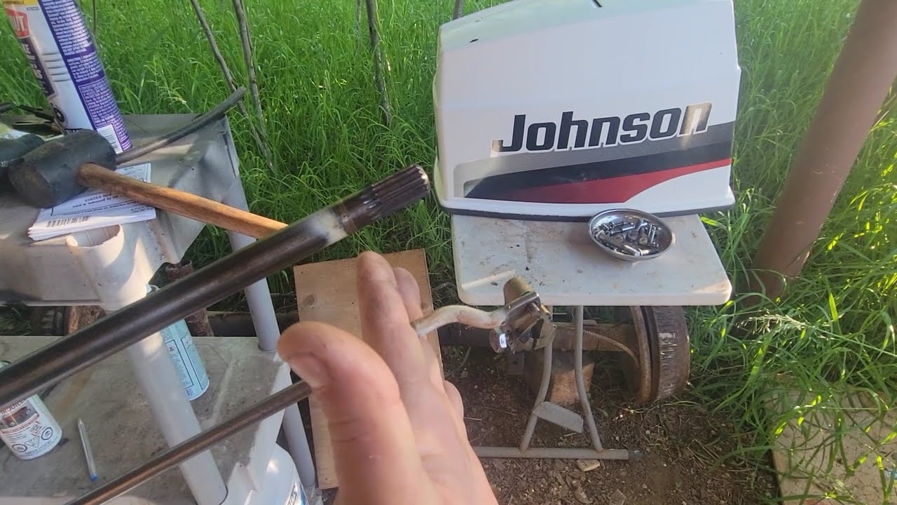 50 hp johnson ..how to disconnect shift shaft linkage - YouTube