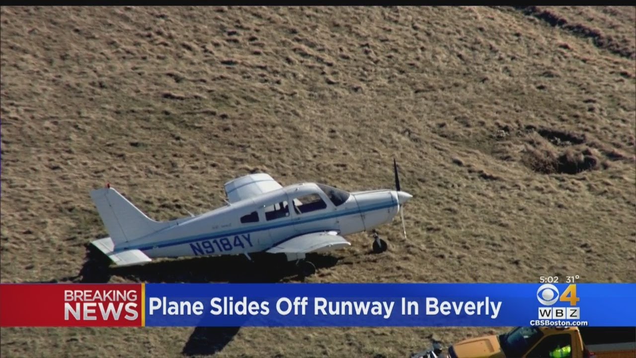 Airplane Slides Off The Runway At Beverly Airport - YouTube