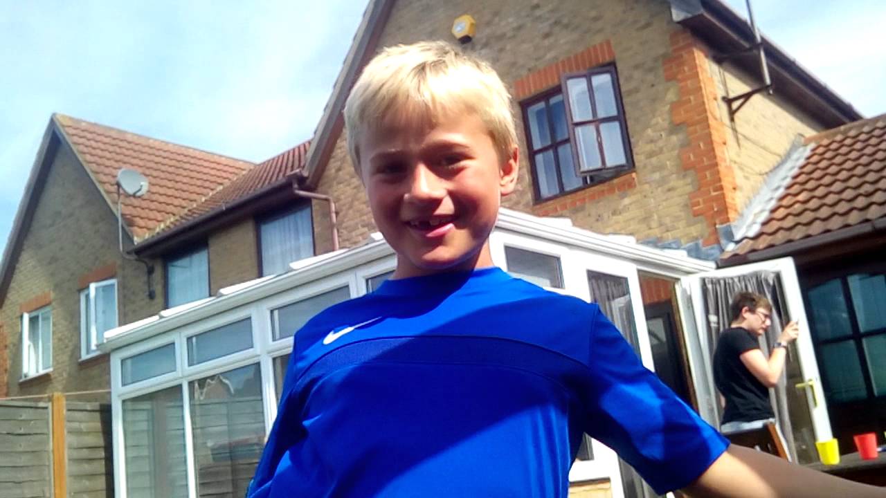 Boys playing football - YouTube