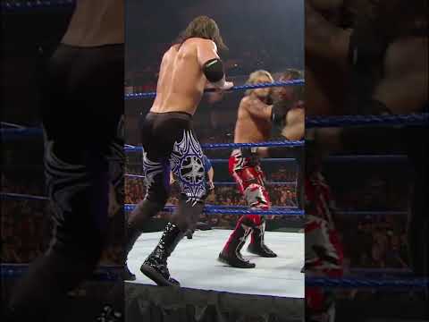Undertaker launches Edge into Zack Ryder, then traps his rival in the lethal Hell’s Gate