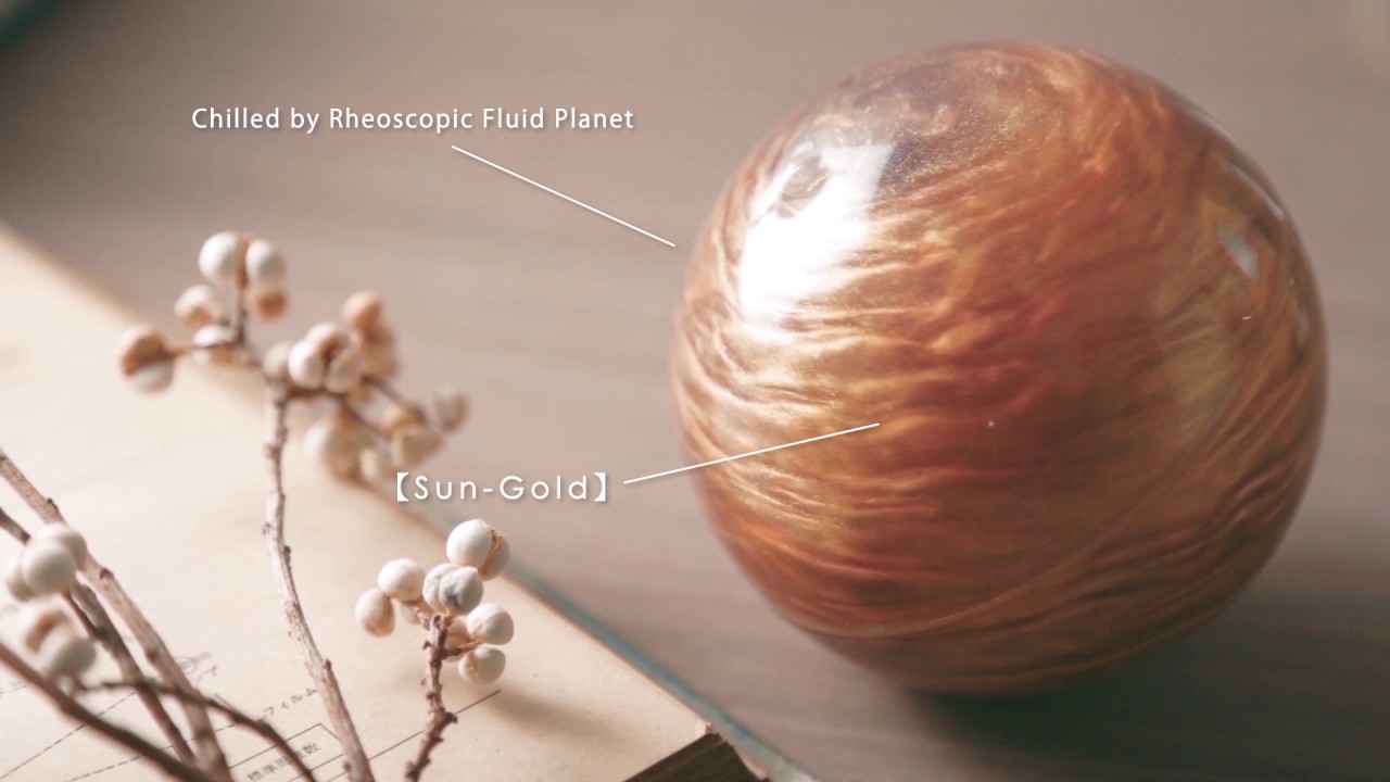 Rheoscopic fluid planet - YouTube