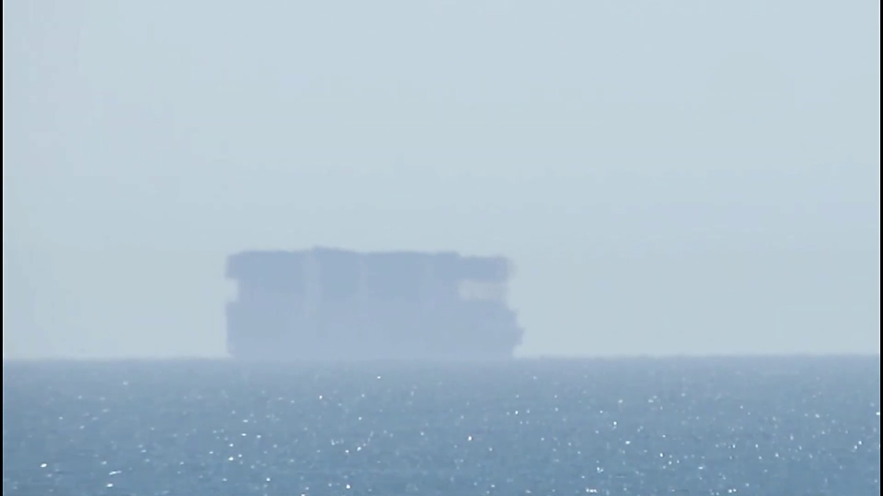 A superior mirage changing appearances of distant ships - YouTube