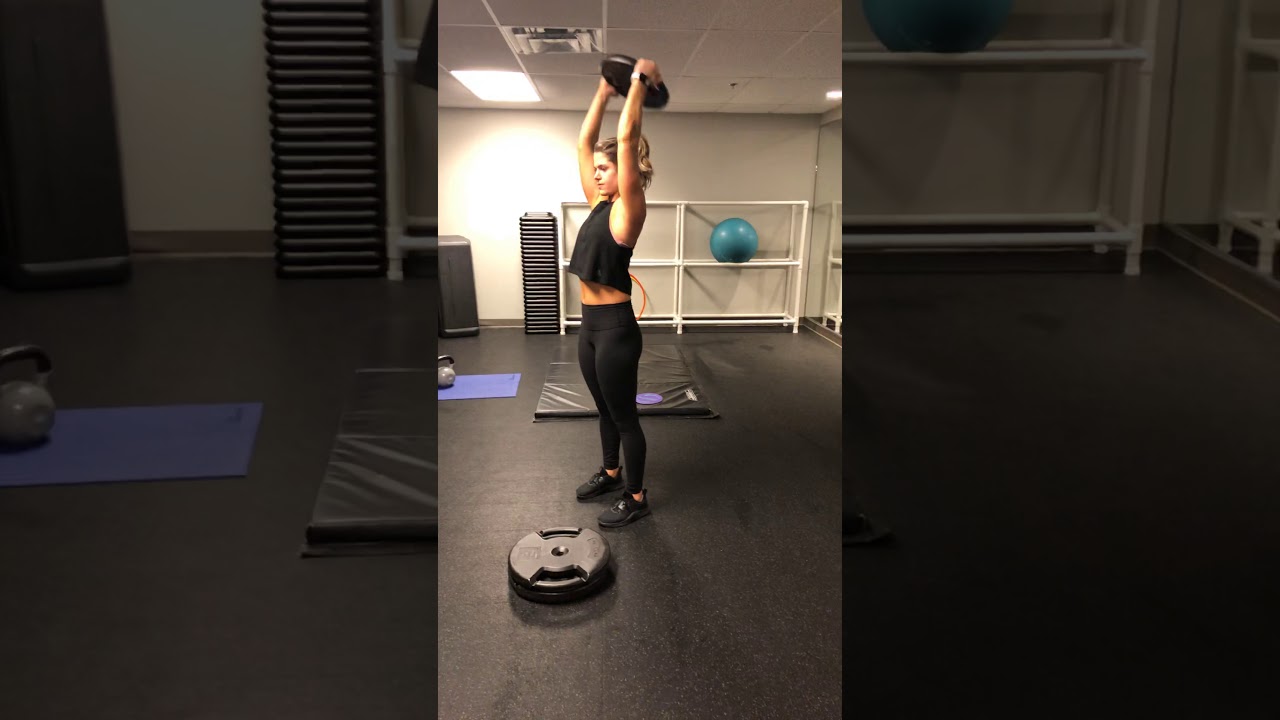 Standing OH tricep extension with plate - YouTube