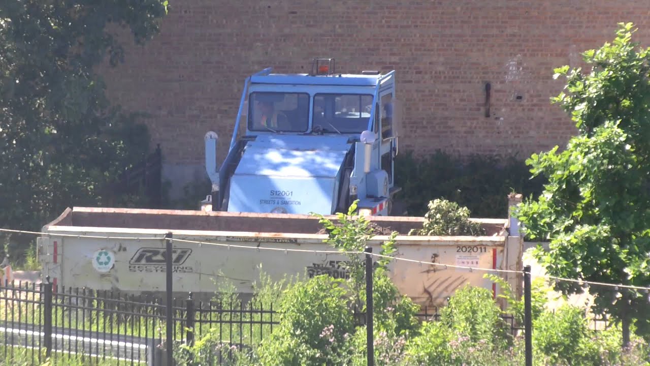 Chicago Street Sweeper Emptying Load - YouTube