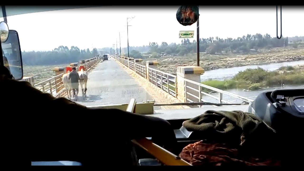Crossing the narrow bridge across River Kaveri on the way to Kollegal ...
