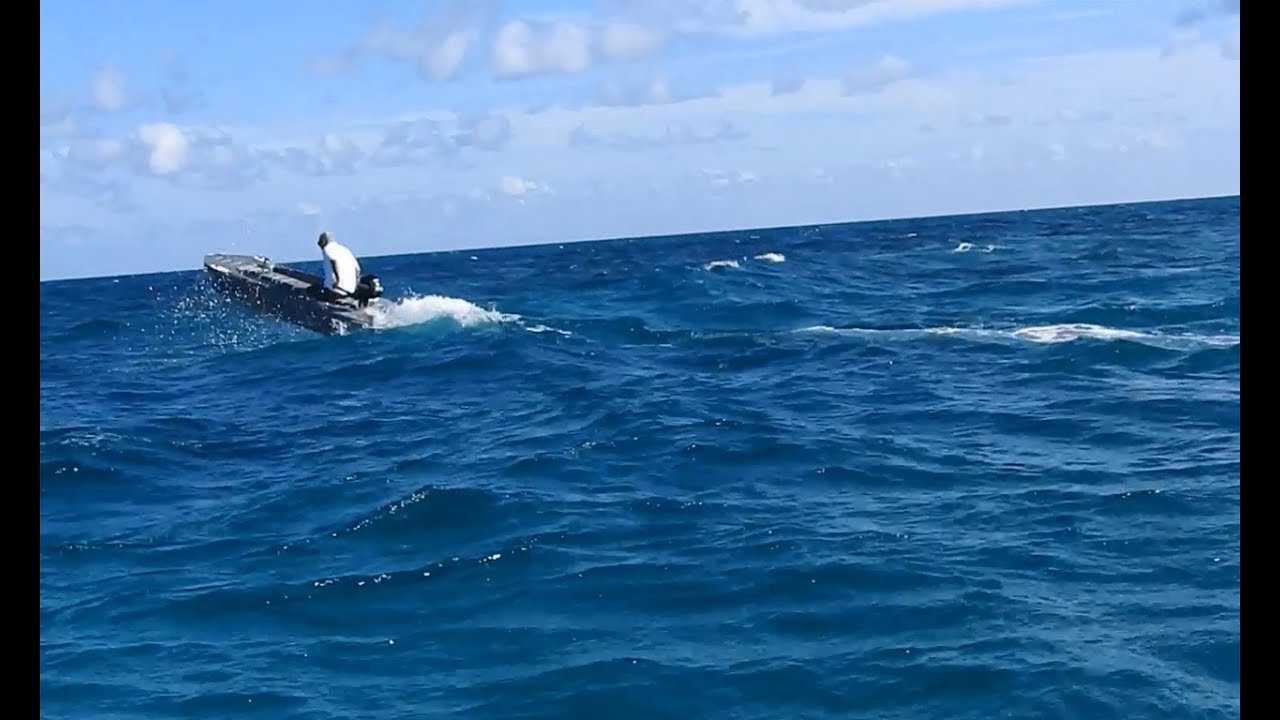 S4 Cartop Microskiff in blue water, under-powered by 3.5 HP outboard ...