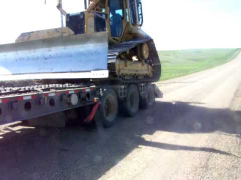 Unloading a D 6 dozer.mov - YouTube