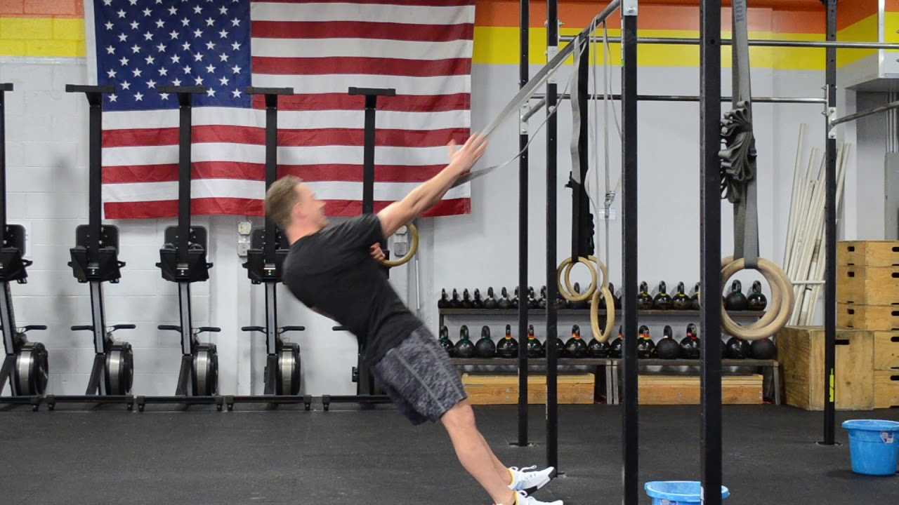 Single Arm Ring Row and Reach - YouTube