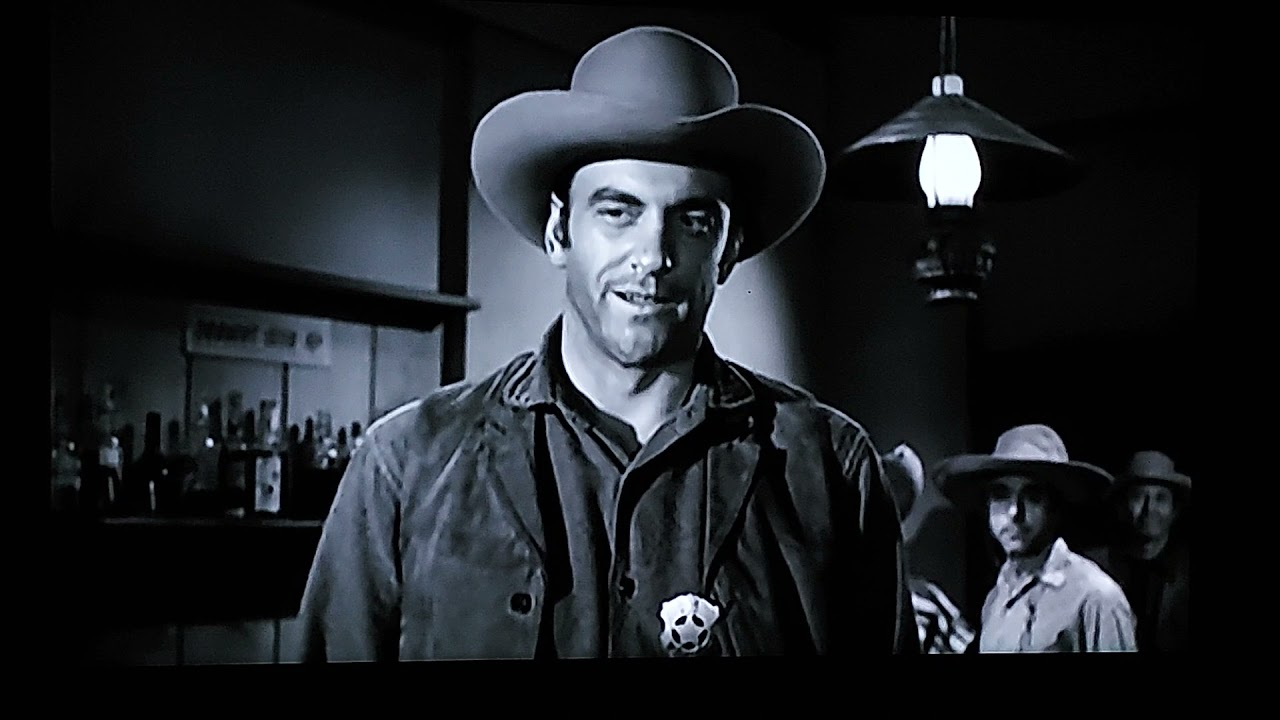 Matt Dillon locks up a crooked Lawman in Gunsmoke - James Arness ...