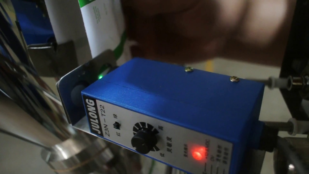 pouch packing machine-adjust sensor - YouTube