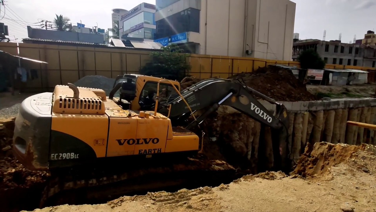 Volvo excavator dangerous stunts in construction area - YouTube